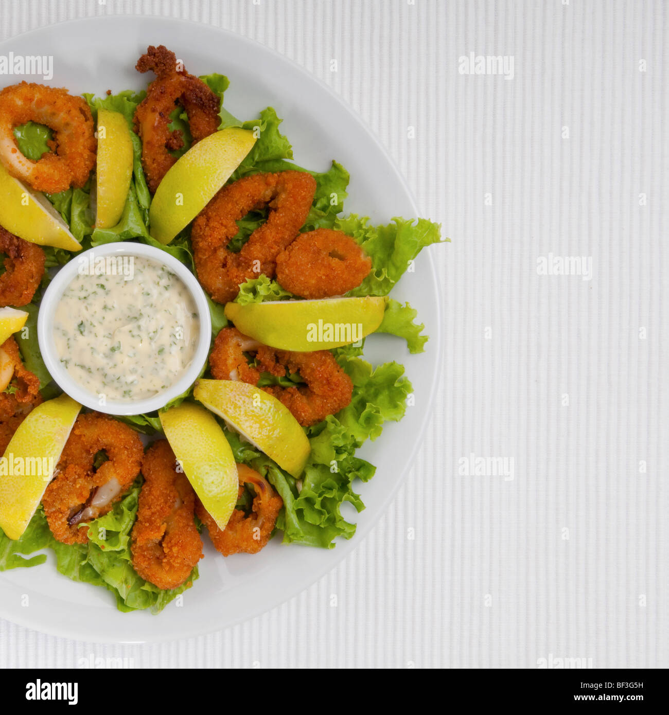 High angle view of crumb fried squid Stock Photo - Alamy