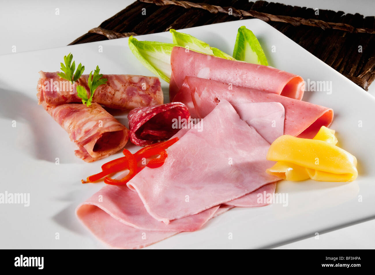 Close-up of salami with ham slices and cheese Stock Photo - Alamy