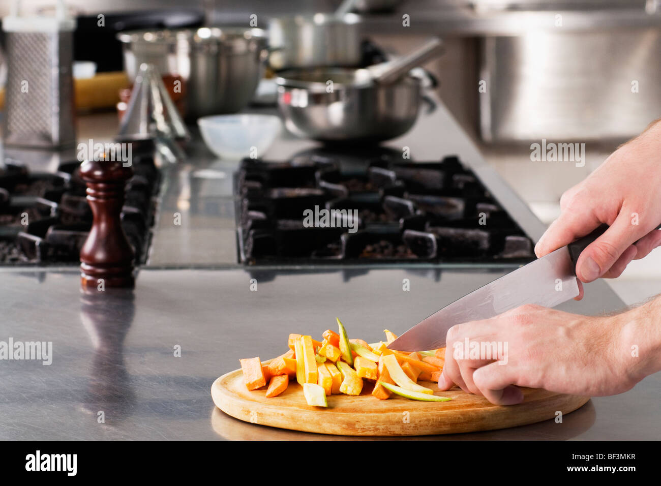 Chef hand holding vegetables hi-res stock photography and images - Alamy