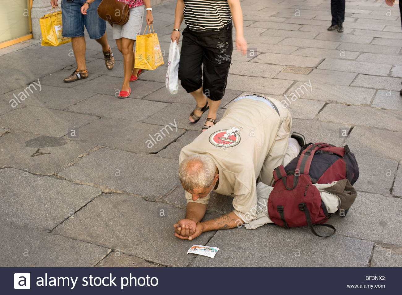 Begging In Streets High Resolution Stock Photography and Images - Alamy