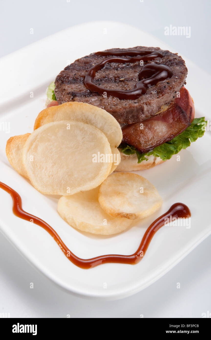 High angle view of an open burger with chips hi-res stock photography ...
