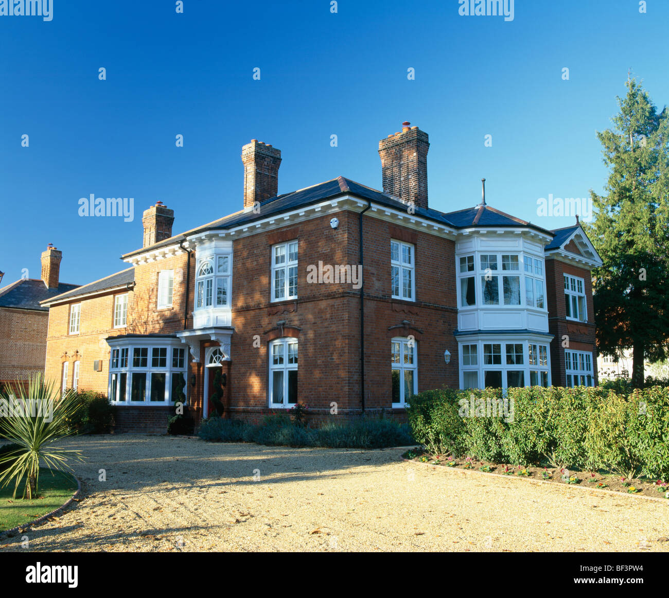 Large Edwardian country house with bay windows Stock Photo - Alamy
