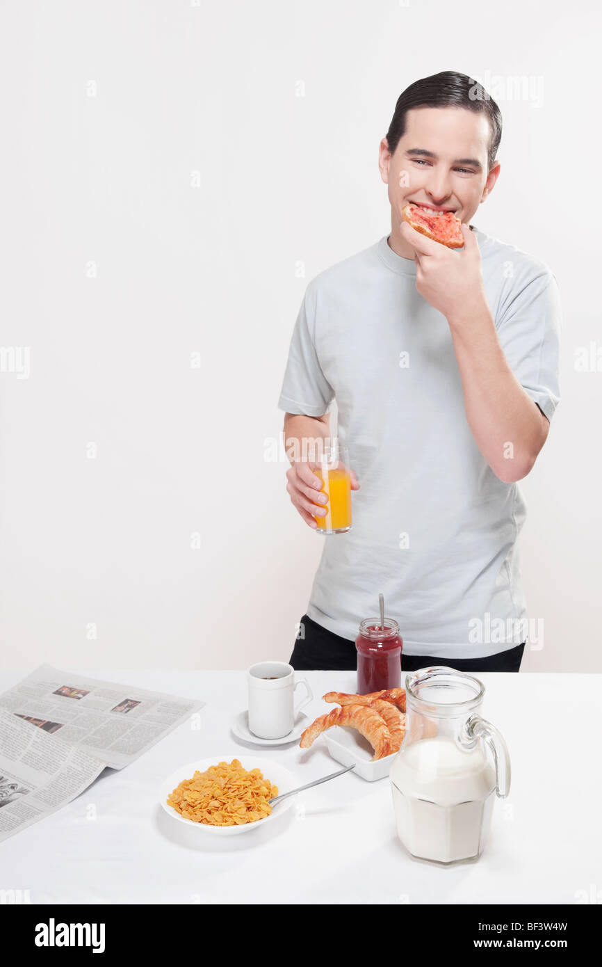 Man having breakfast Stock Photo - Alamy
