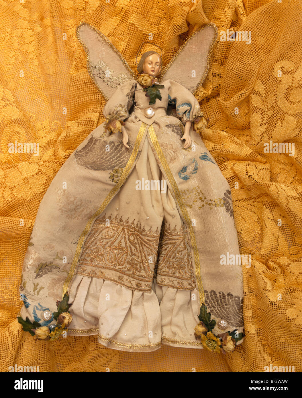 Angel sewing hi-res stock photography and images - Alamy