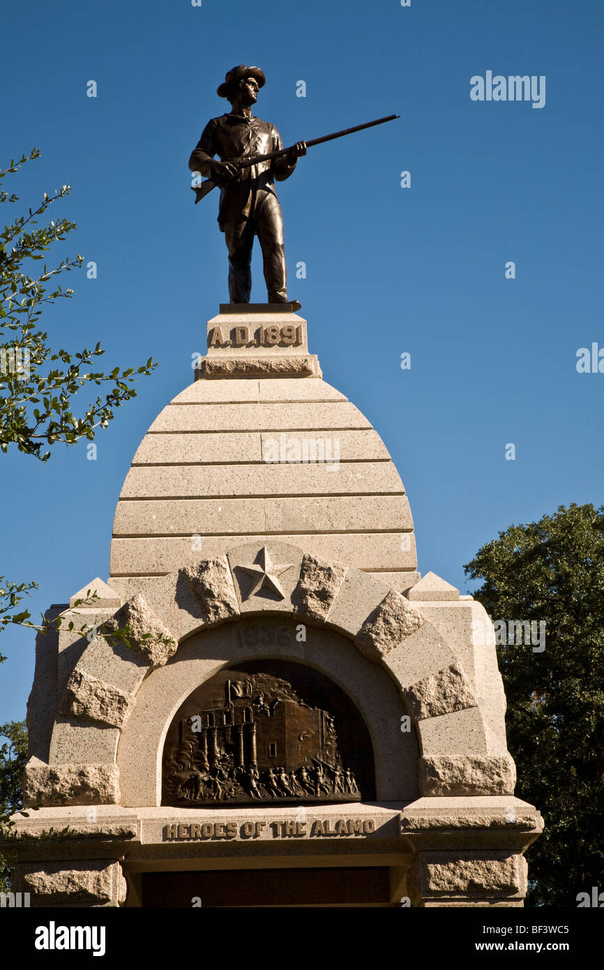 A memorial to the defenders of the Alamo stands in front of the Texas ...