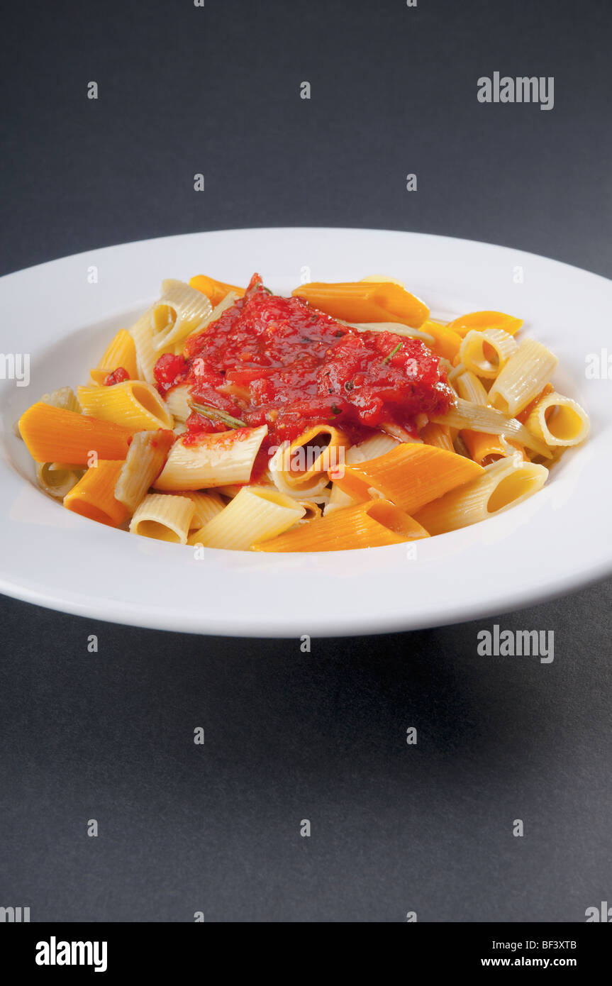 Close-up of rigatoni pasta topped with tomato concasse Stock Photo - Alamy