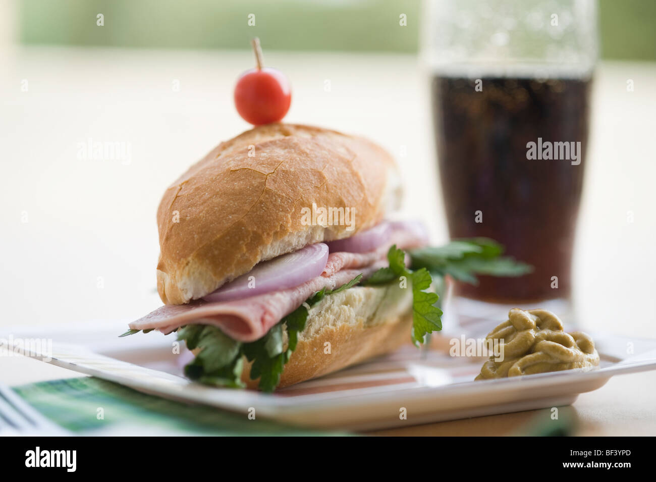 Salami sandwich served with cola Stock Photo - Alamy