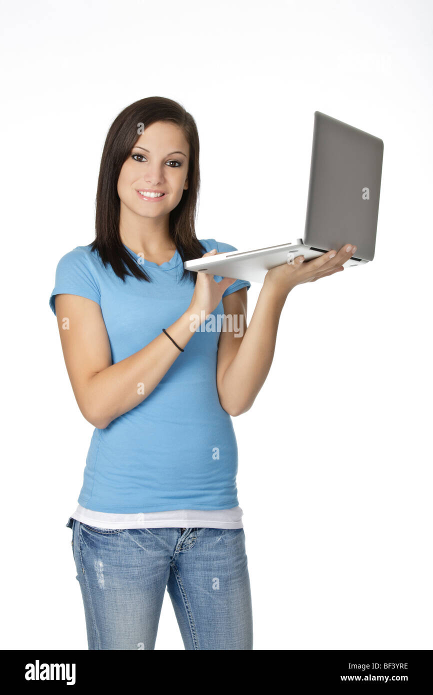 Cute Caucasian student holding a computer on a white background Stock ...
