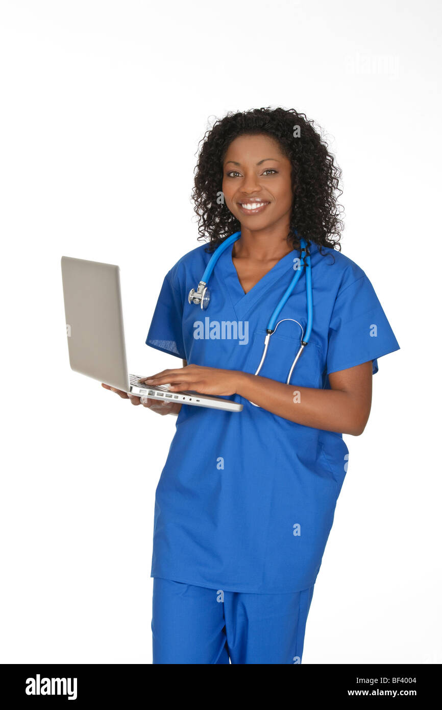 Beautiful African American doctor or nurse holding a laptop computer ...