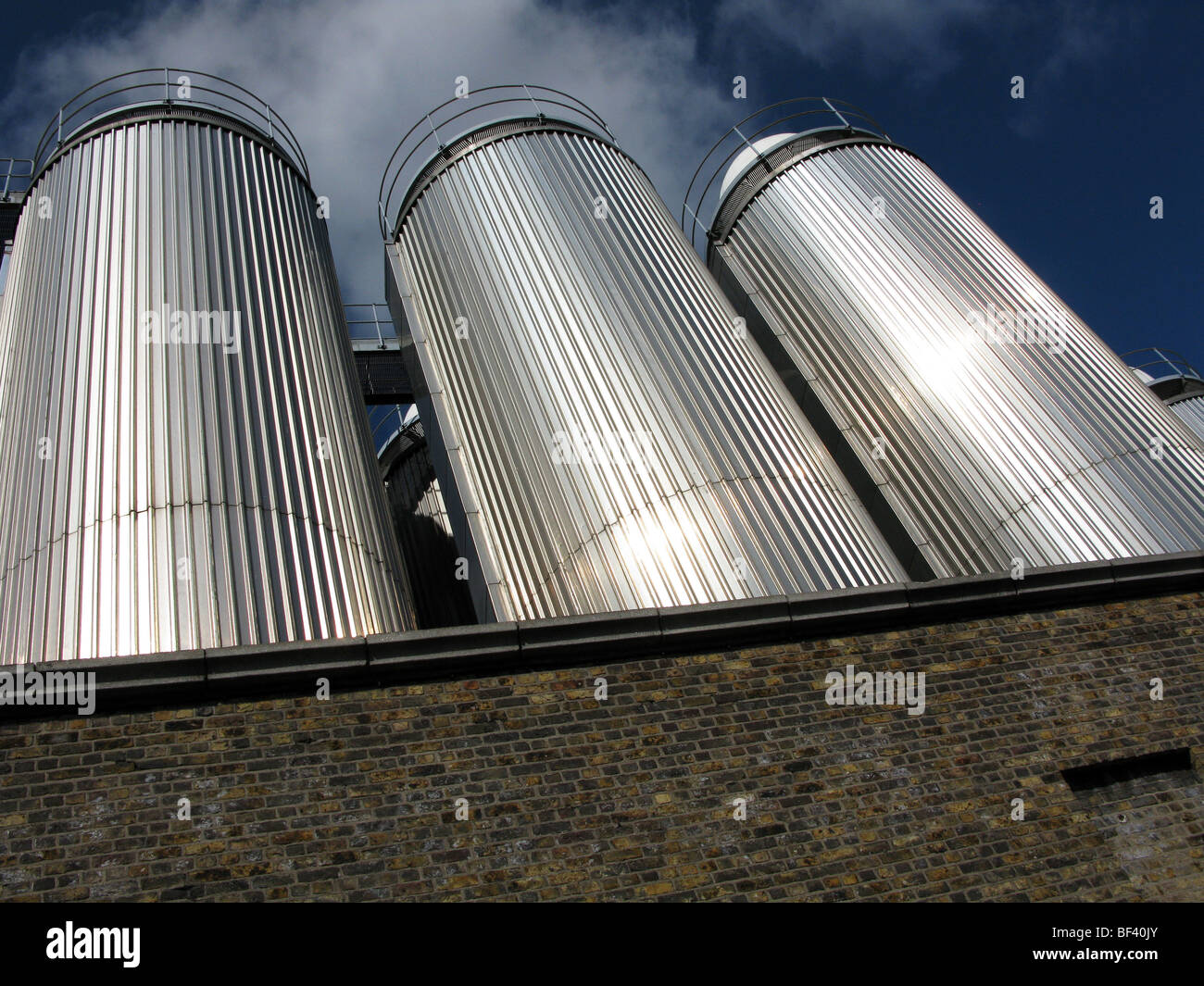 Beer tanks at a factory building near Dublin Stock Photo - Alamy