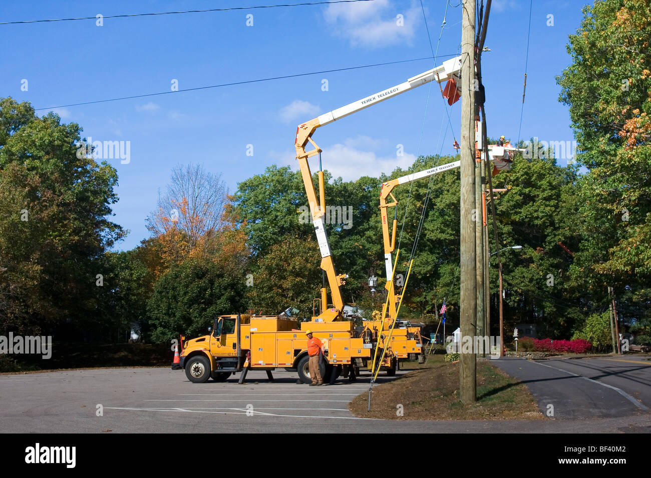 Electric Company Utility Crew Repairs a Local Powerline, Newmarket, New ...