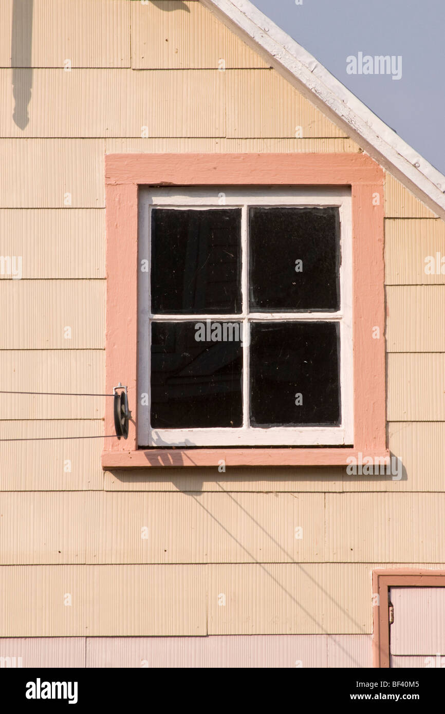 Pastel colors on an outside wall surrounding a window Stock Photo - Alamy