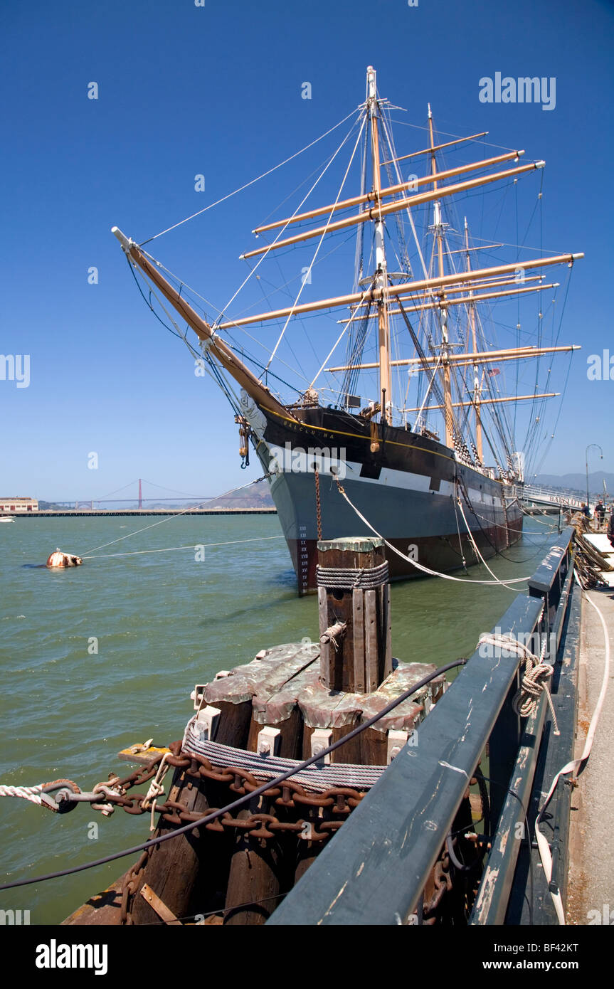 Balclutha square-rigger at Hyde Street Pier with Golden Gate Bridge in ...