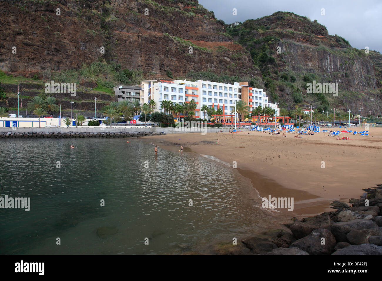 sandy beach at hotel and marina of Calheta island of Madeira, Portugal ...