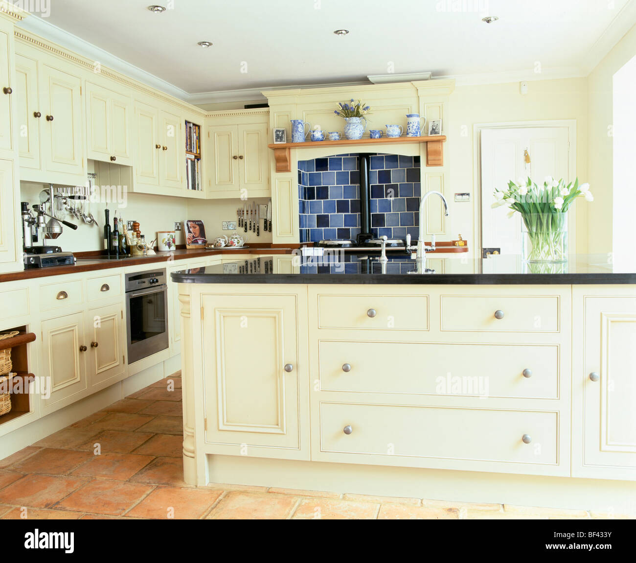 Large traditional cream country kitchen with granite-topped island unit ...