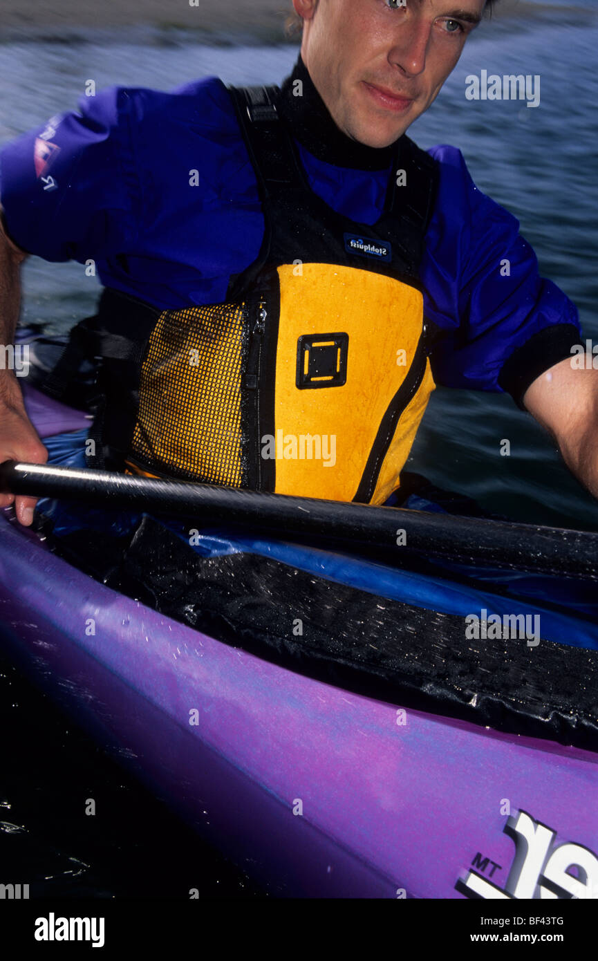 Man sea kayaking Stock Photo - Alamy