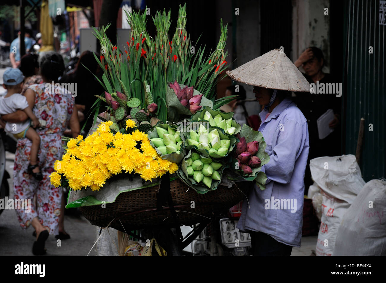 woman carrying transporting carry transport heavy load overloaded ...
