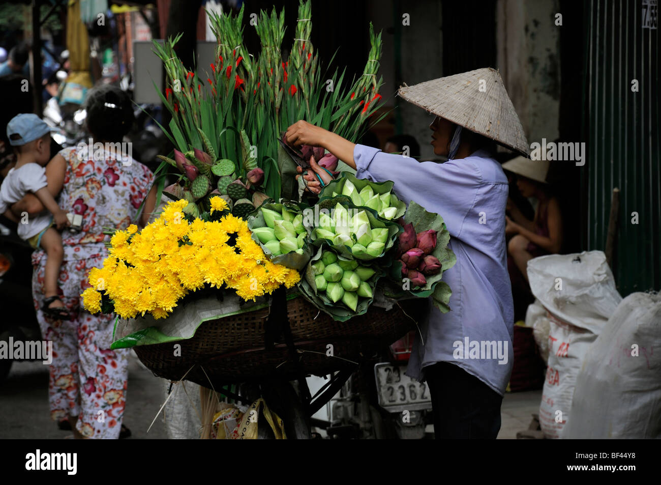 woman carrying transporting carry transport heavy load overloaded ...
