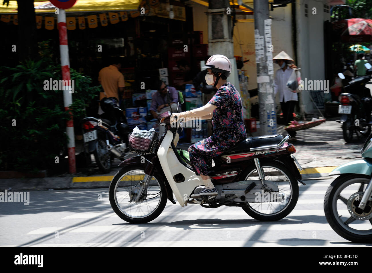 man carrying transporting carry transport motorbike ho chi minh vietnam ...