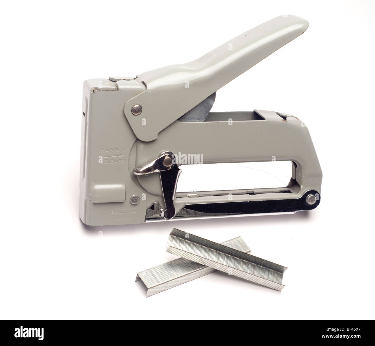 staple gun machine with staples isolated on white Stock Photo - Alamy