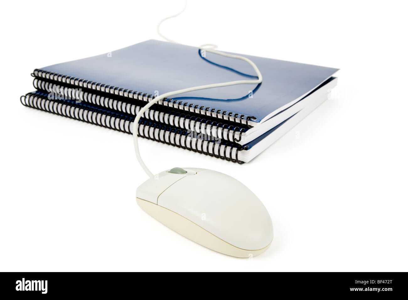 Blue school textbook and computer mouse, online learning Stock Photo ...