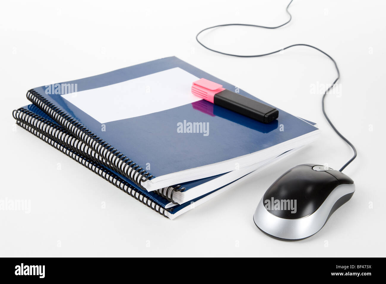 Blue school textbook and computer mouse, online learning Stock Photo ...
