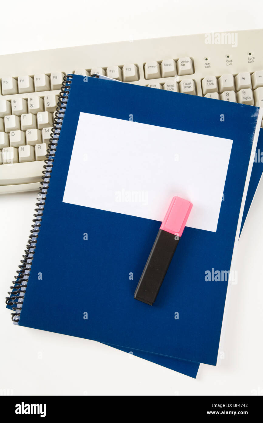 Blue school textbook and computer keyboard, online learning Stock Photo ...