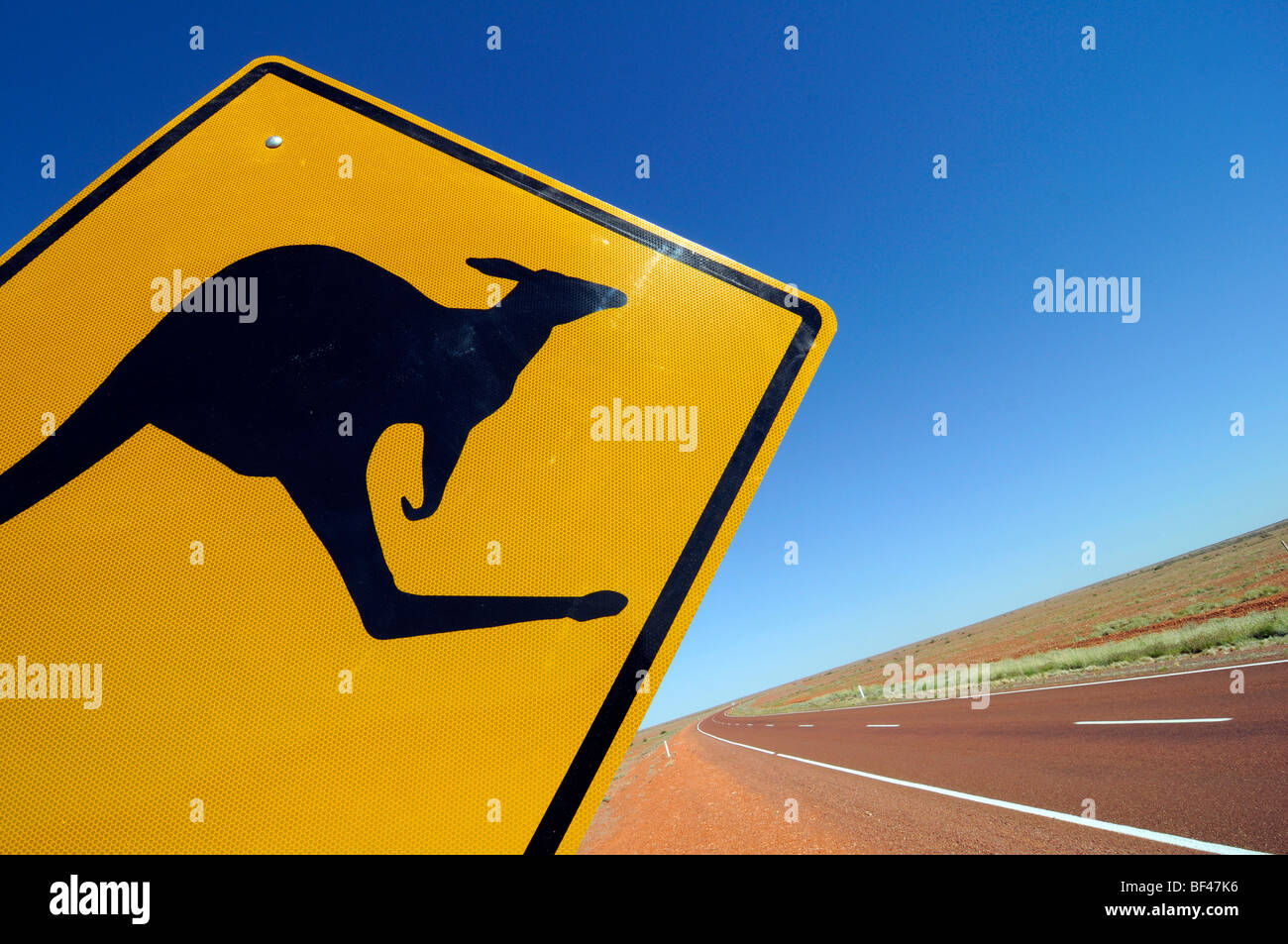 A kangaroo road sign near a highway in central Australia Stock Photo ...