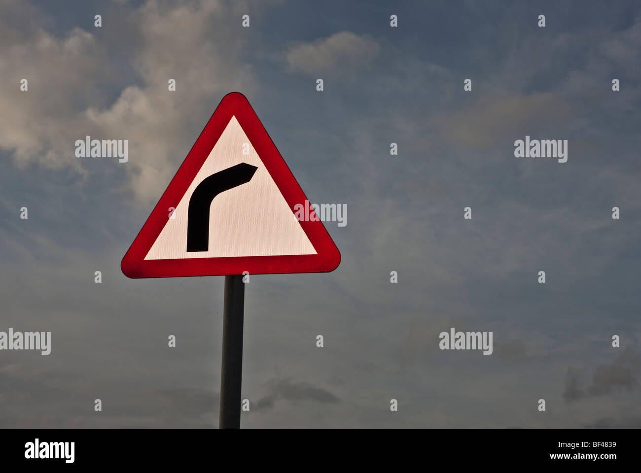 Waring sign against a dark sky Stock Photo - Alamy