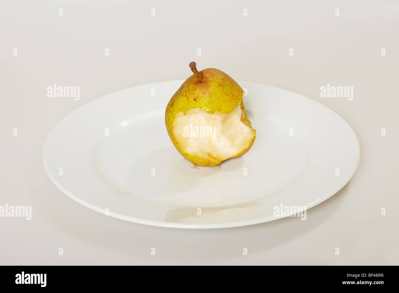 Pear eaten hi-res stock photography and images - Alamy