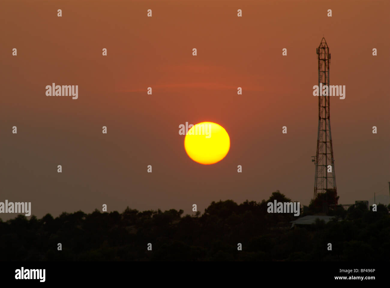 Radio pylon at sunset Stock Photo - Alamy