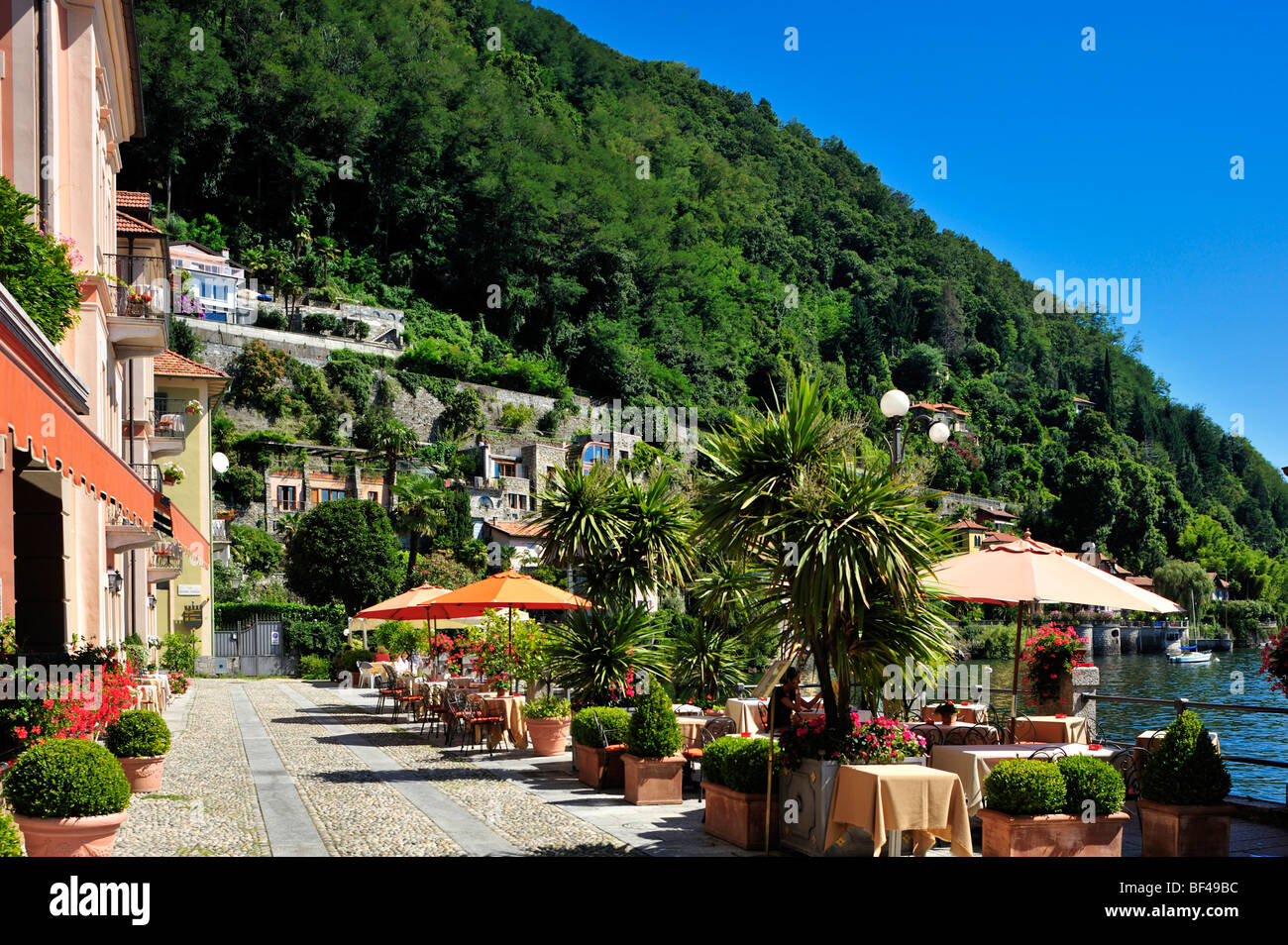 Promenade with restaurant terraces, Lake Maggiore, Cannero Riviera ...