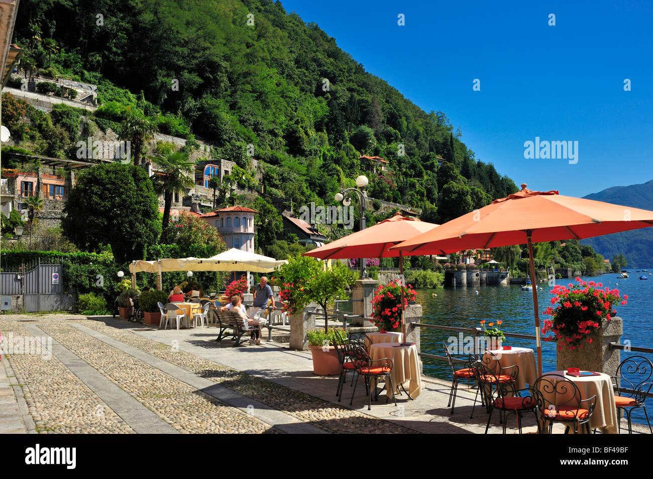 Promenade with restaurant terraces, Lake Maggiore, Cannero Riviera ...
