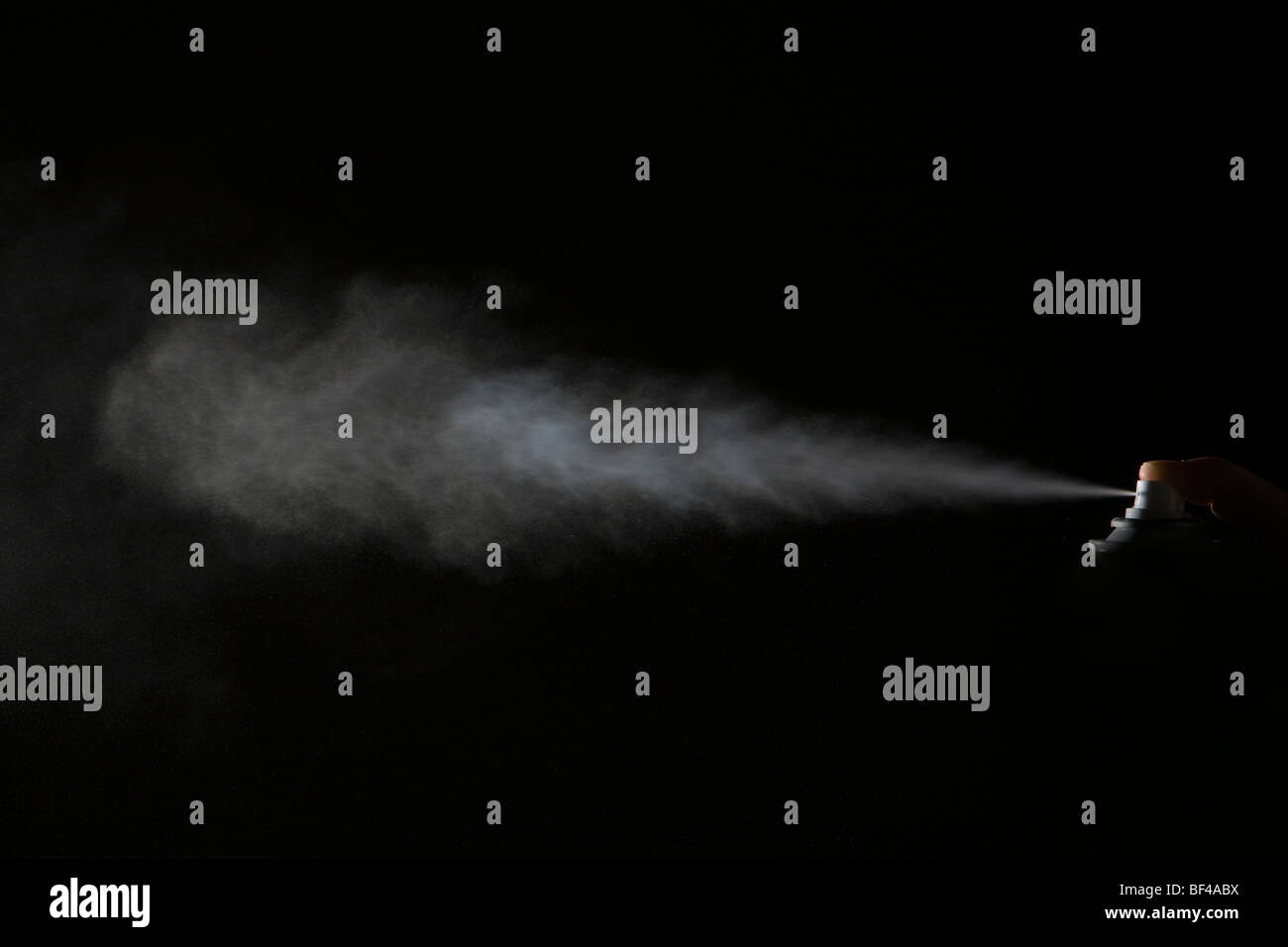 can with a jet of spray coming out Stock Photo - Alamy