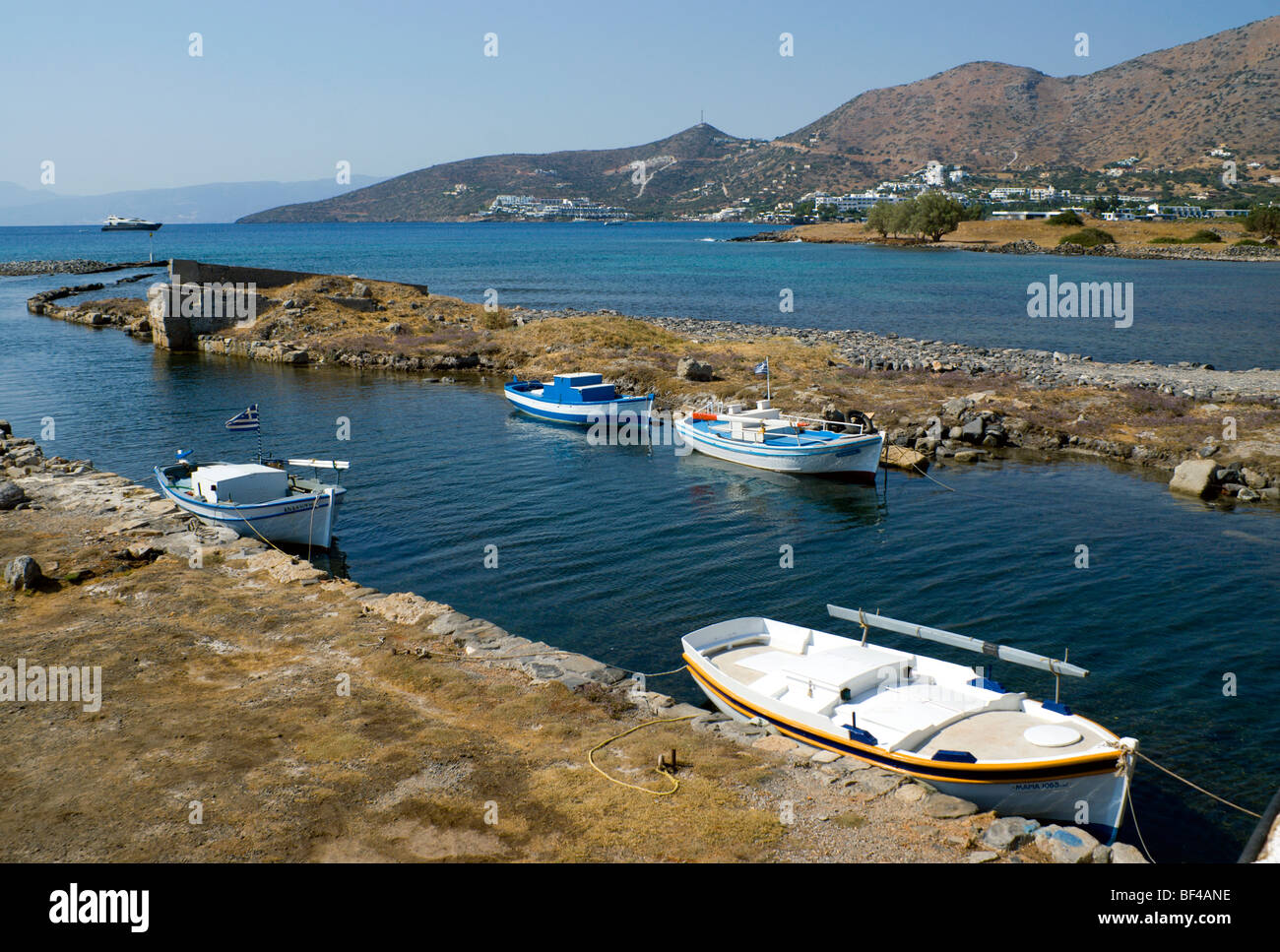 fishing boats kolokitha canal elounda crete greece Stock Photo - Alamy