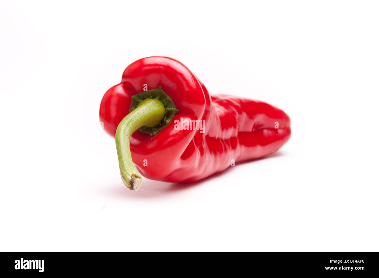 Single Large red sweet pepper isolated against white background Stock ...