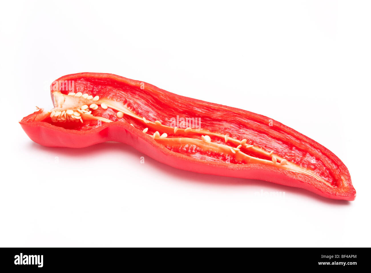Single Large red sweet pepper sliced isolated against white background ...