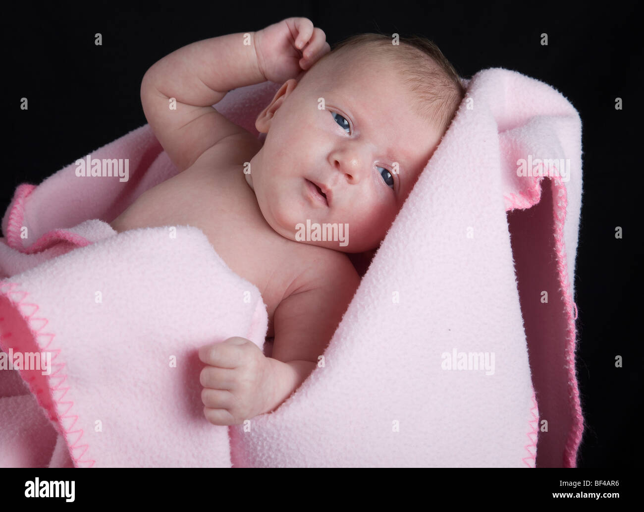Baby, girl, 5 weeks old, on her mother's hand Stock Photo - Alamy