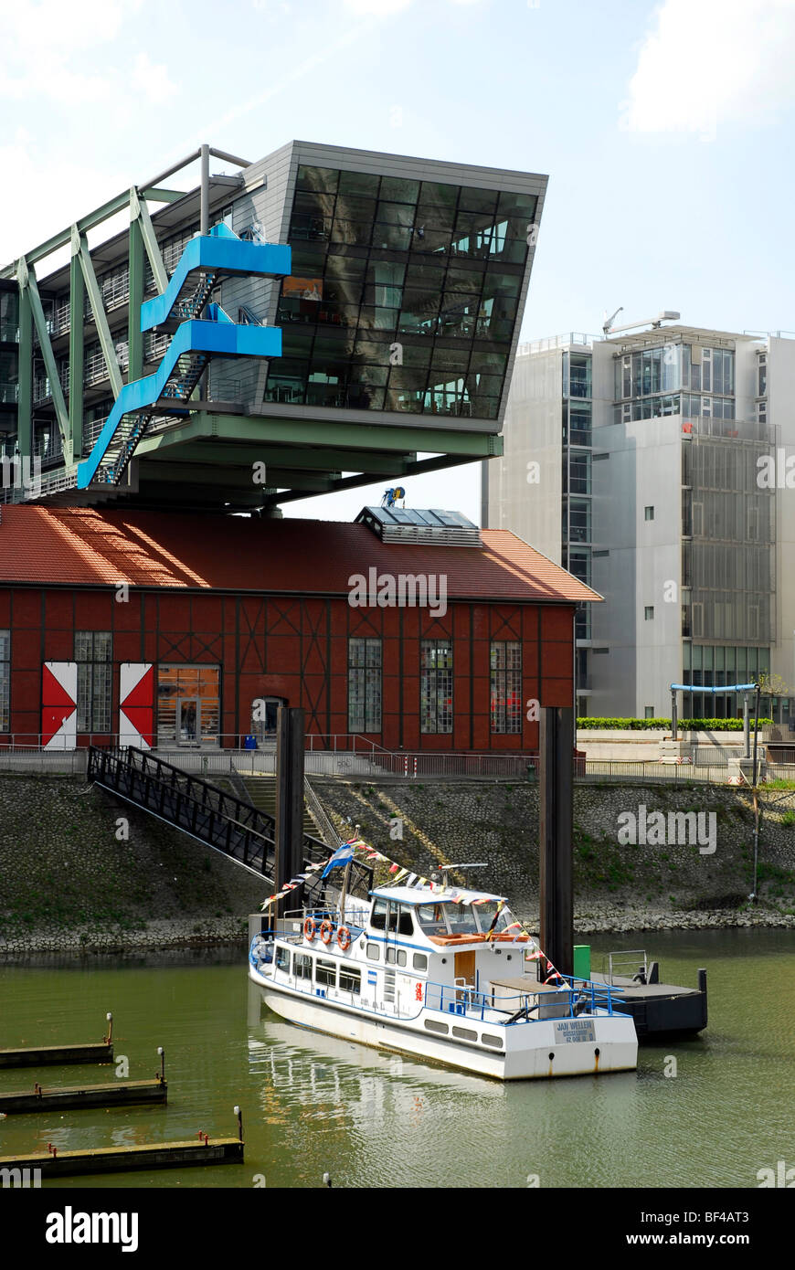 Excursion boat in front of the Port Event Centre, architecture at the ...