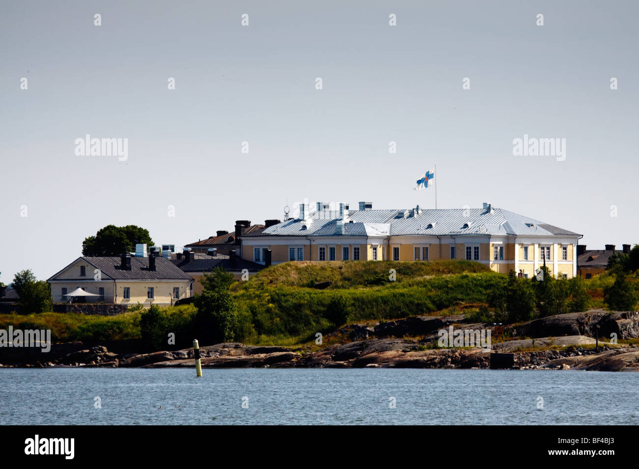 Naval Academy flying the Finnish Ensign at Suomenlinna, Helsinki Stock ...