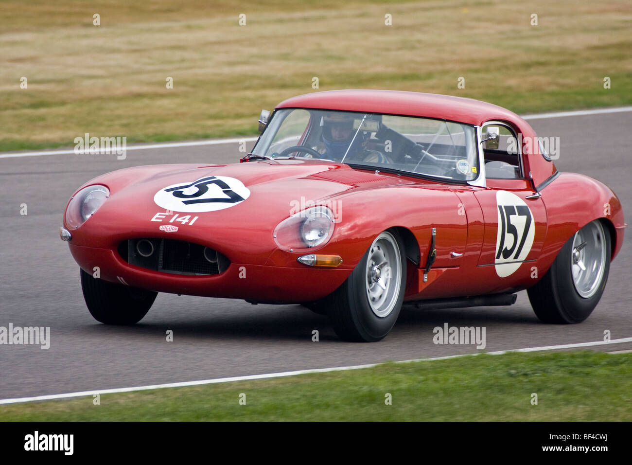 1961 Jaguar E-Type, with driver Nigel Webb, during the RAC TT race at ...