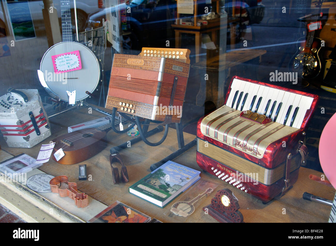 Musical instrument shop window Stock Photo - Alamy