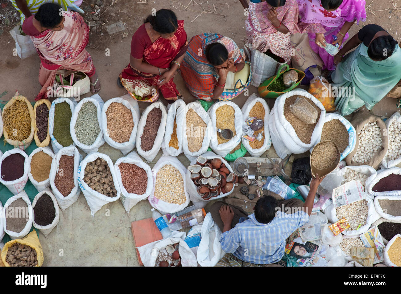 Indian street market with sacks of Indian spices and dried produce ...