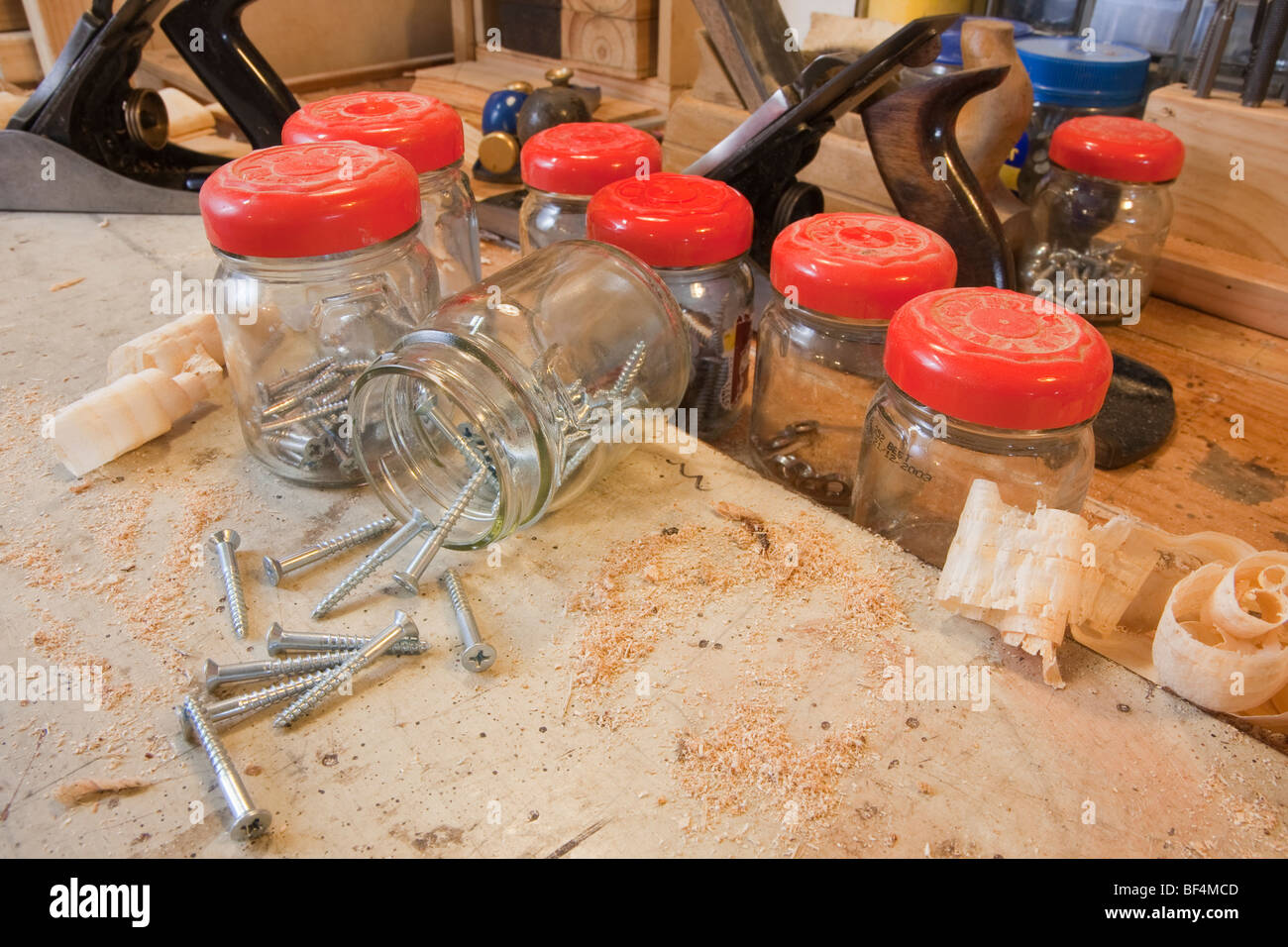 Workbench with tools and loose screws Stock Photo - Alamy
