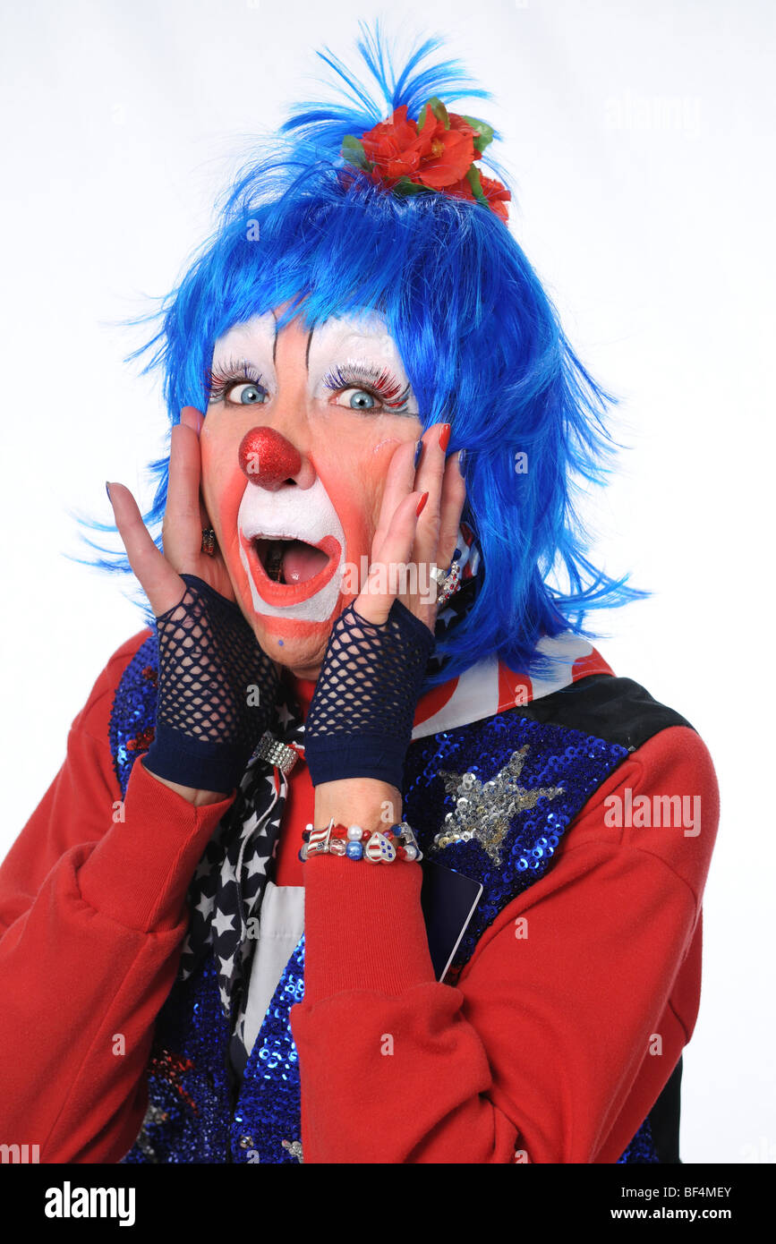 Clown showing surprise isolated over a white background Stock Photo - Alamy