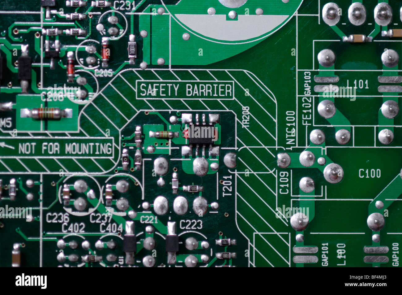 Macro close-up of electronics showing safety barrier between high ...