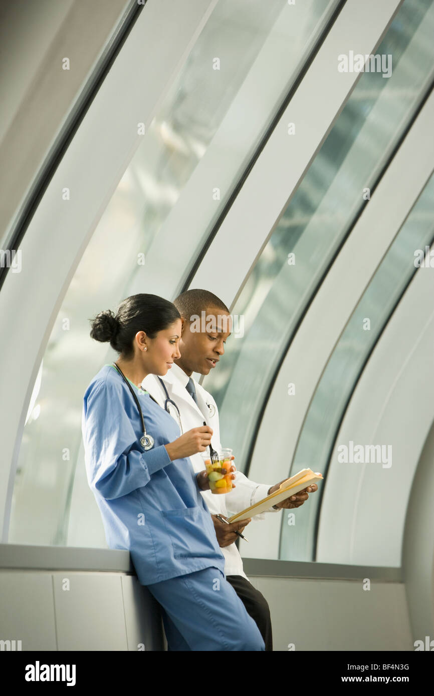 Doctor and nurse reviewing medical chart Stock Photo - Alamy Doctor and nurse reviewing medical chart Stock Photo - Alamy