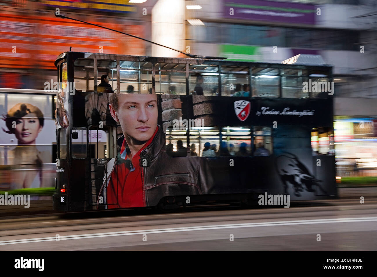 China, Hong Kong, Hong Kong Island, Wan Chai, brightly coloured trams ...