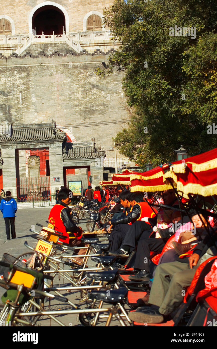 Rickshaw drivers waiting for customer near Bell Tower, Beijing, China ...
