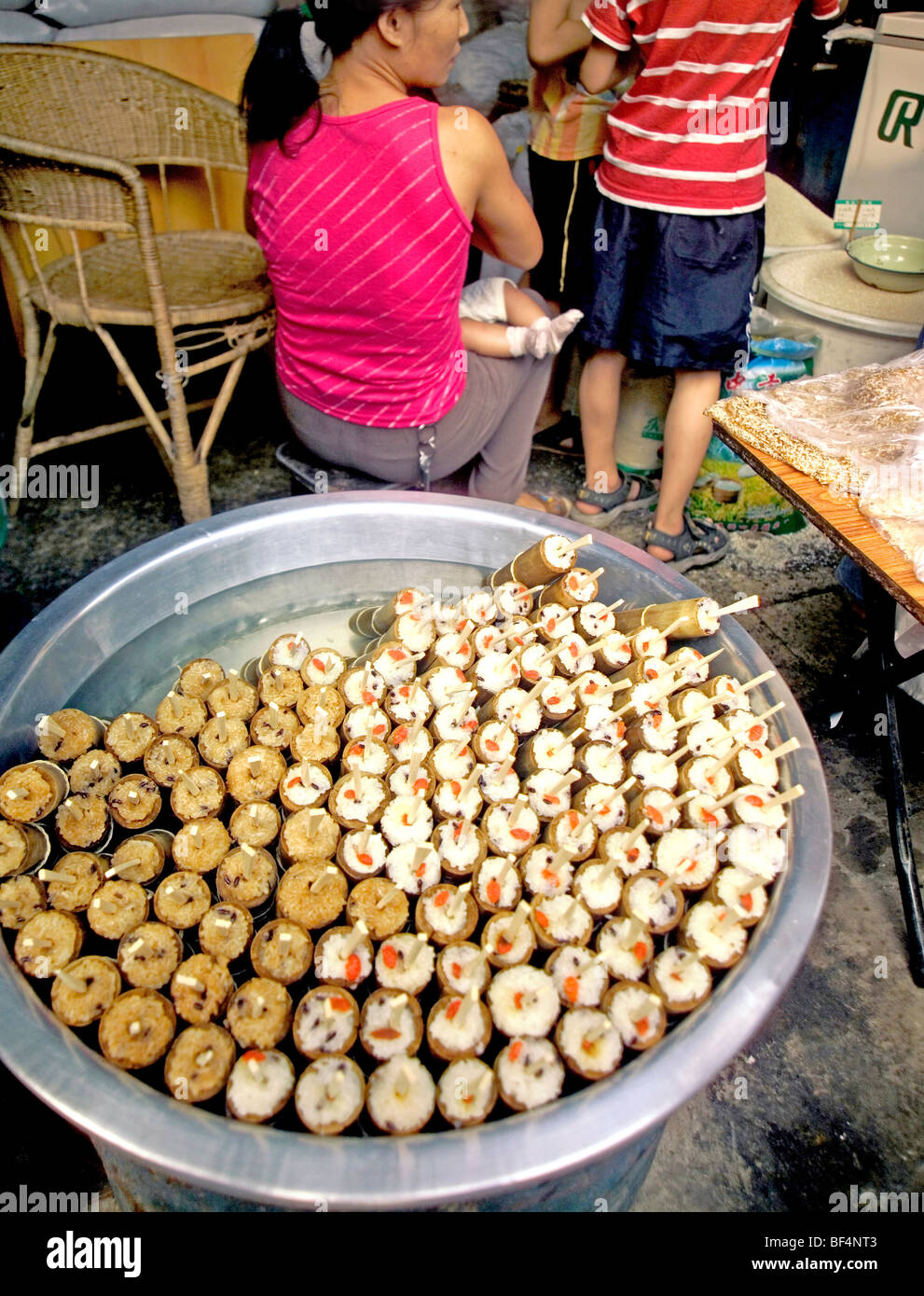 Local delicacy sticky rice in bamboo tube, Ciqikou, Chongqing, China ...